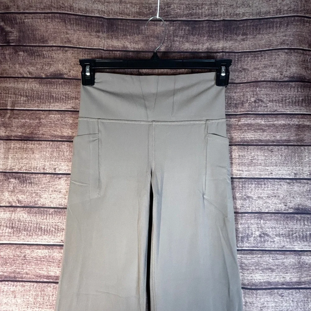 Athleta | Pants & Jumpsuits | Athleta Salutation Stash Flare Pant ...